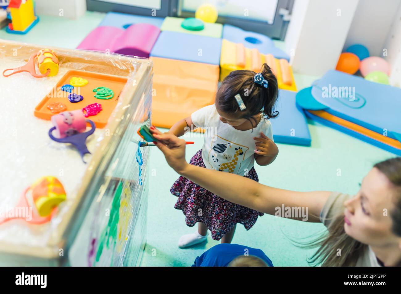 preschoolers having fun and painting. High quality photo Stock Photo ...