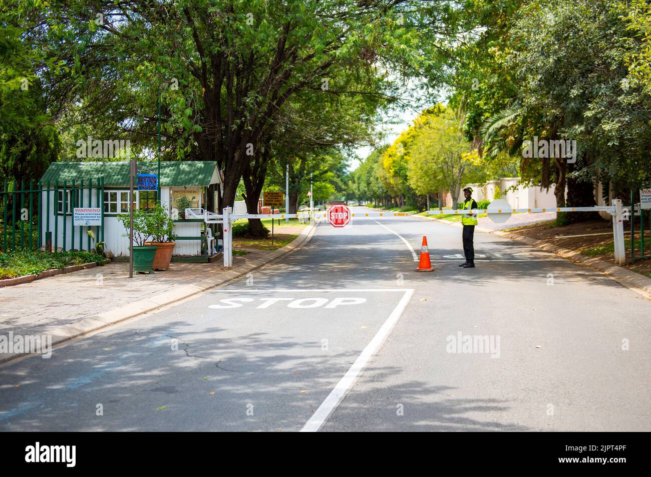 Suburban security gate Stock Photo - Alamy