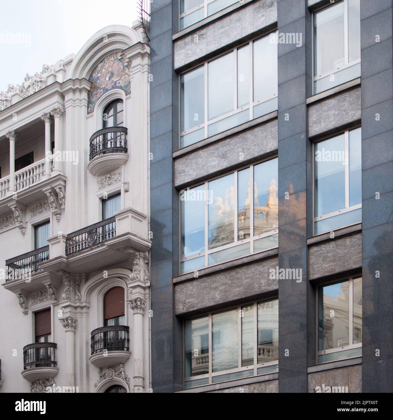 The beautiful stone buildings balconies and windows on Gran via street ...