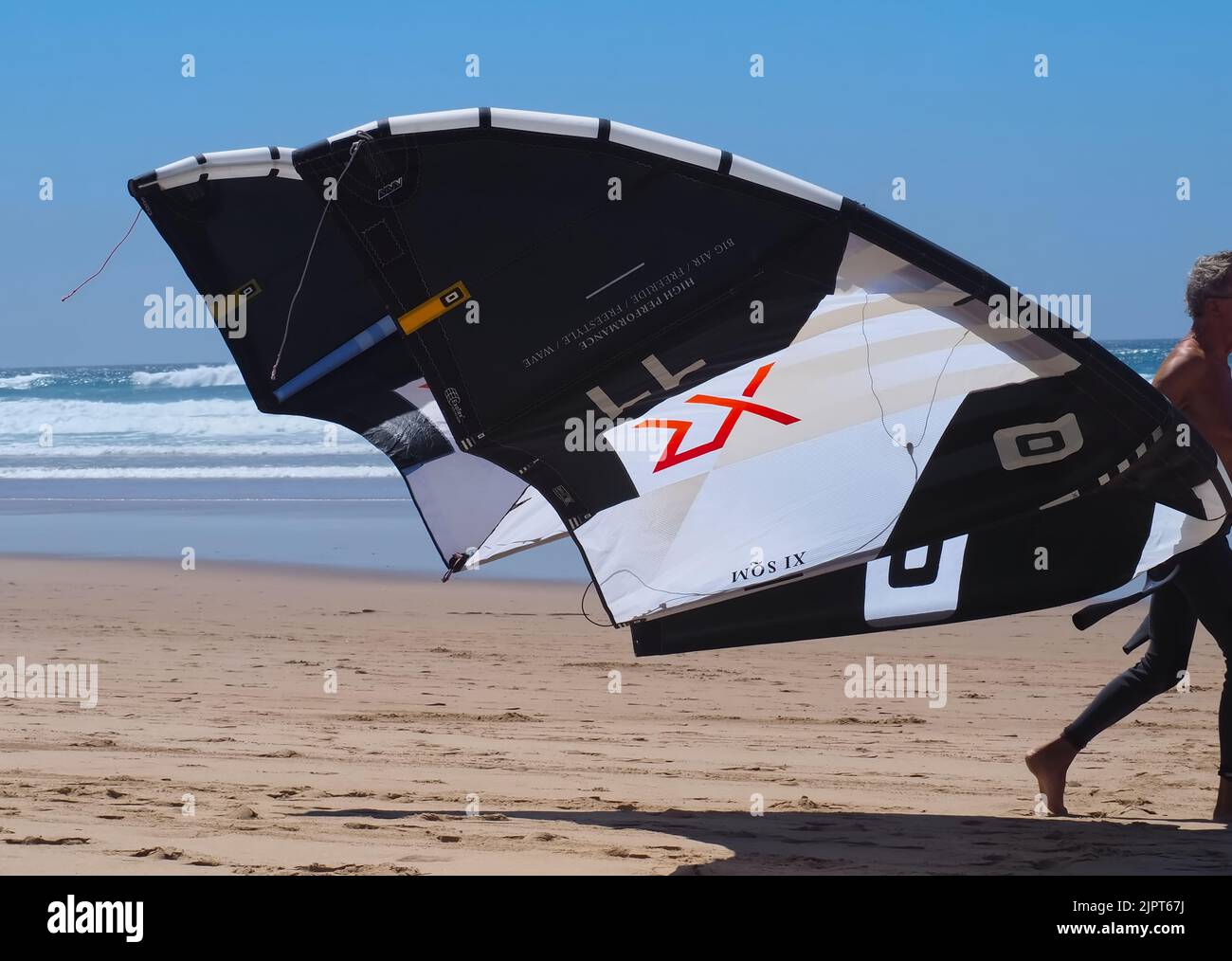 Core kite surfing umbrella in black and white at the beach Stock Photo ...
