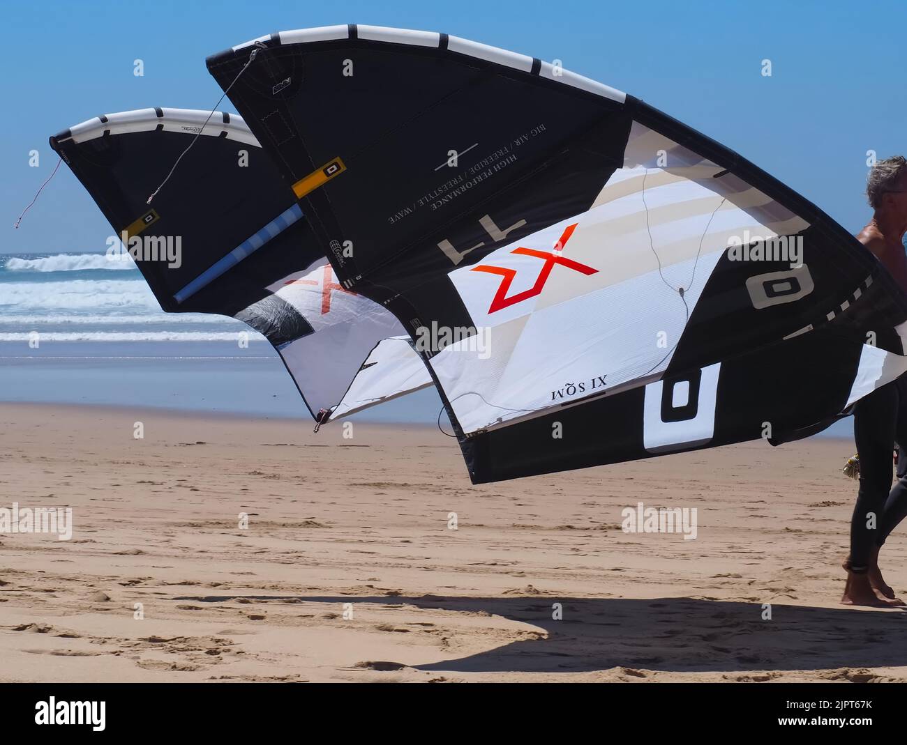 Core kite surfing umbrella in black and white at the beach Stock Photo ...