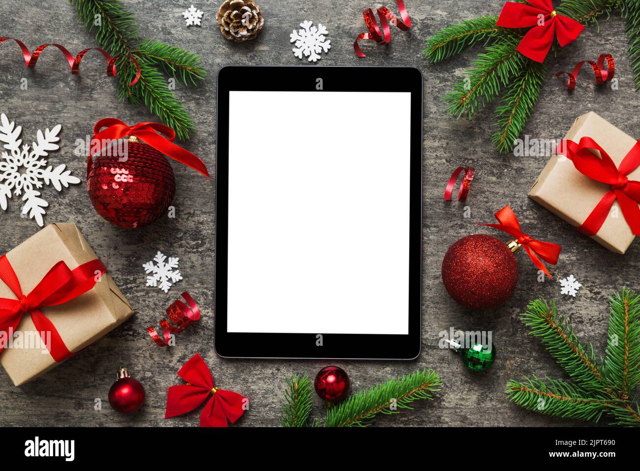Digital tablet mock up with rustic Christmas decorations for app ...
