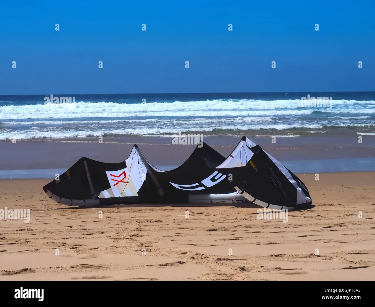 Core kite surfing umbrella in black and white at the beach Stock Photo ...