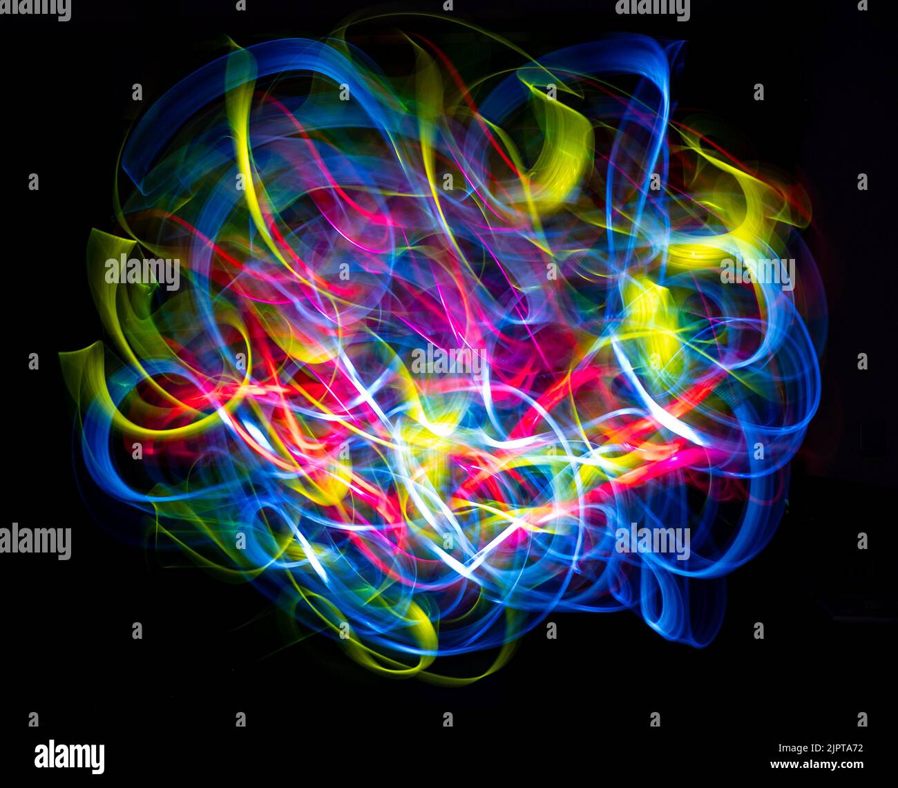 colored lights forming an abstract light art pattern. Light painting ...