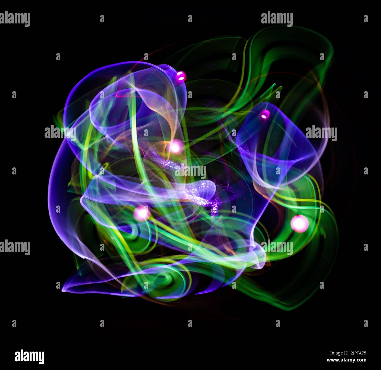 colored lights forming an abstract light art pattern. Light painting ...