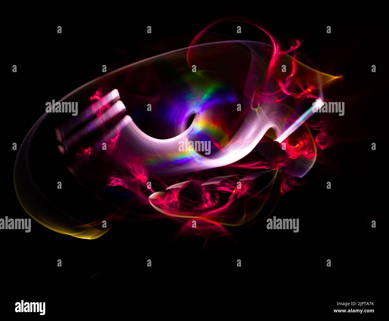 colored lights forming an abstract light art pattern. Light painting ...