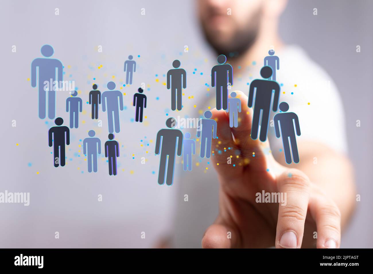 A 3d rendering of blue human icons with a hand pointing at them. Human ...