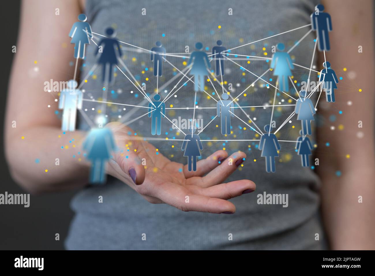 A 3d rendering of connected human icons over a hand. The concept of ...