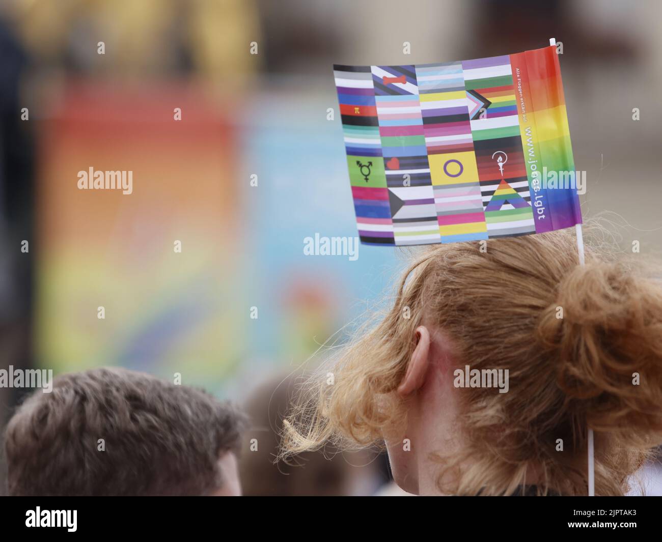 Magdeburg, Germany. 20th Aug, 2022. Participants of the CSD stand at ...