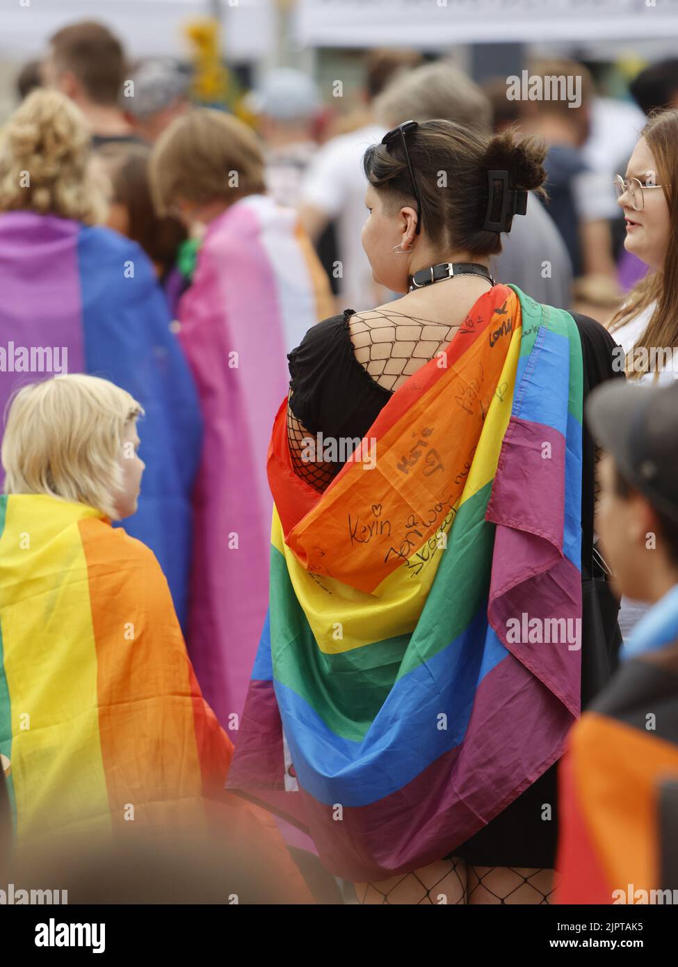 Magdeburg, Germany. 20th Aug, 2022. Participants of the CSD stand at ...