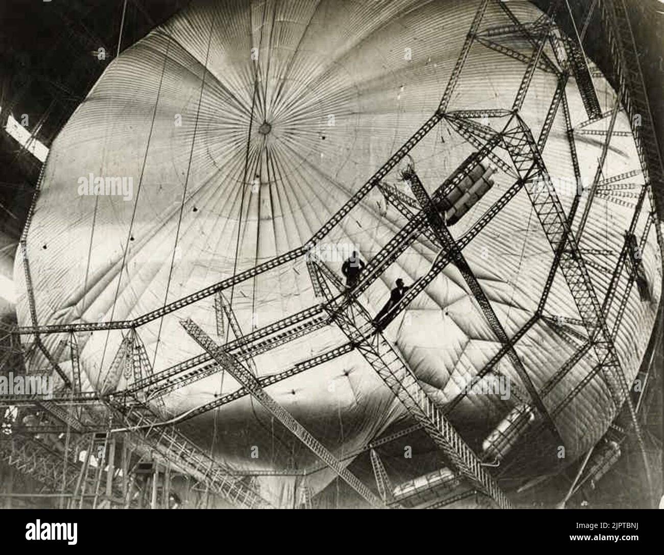 The ill fated British airship R101 during its construction. The men ...