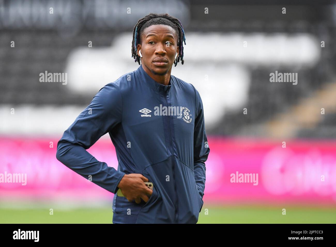 Gabriel Osho #32 inspects the pitch pre kick off Stock Photo - Alamy