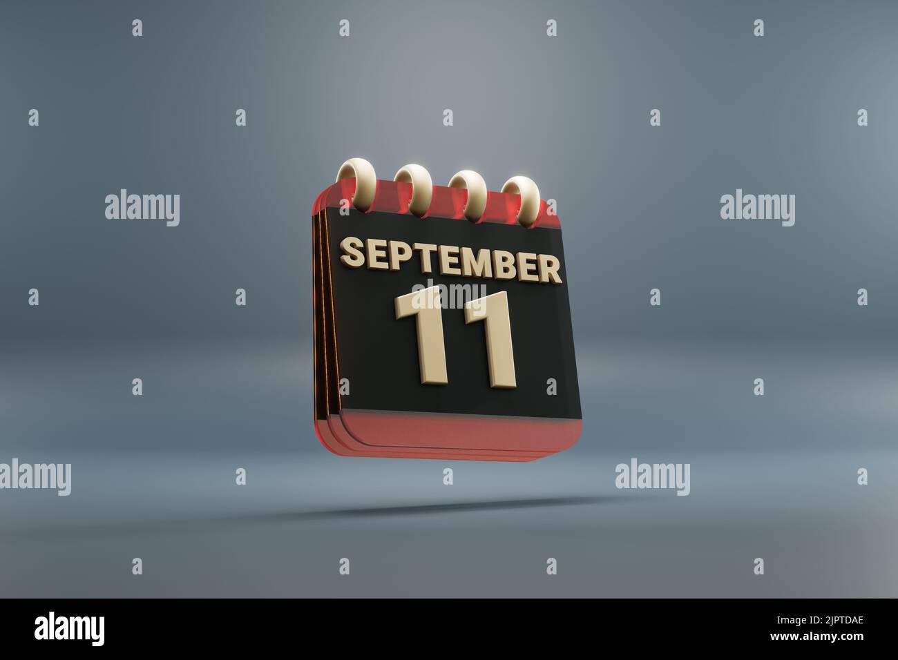 Standing black and red month lined desk calendar with date September 11 ...