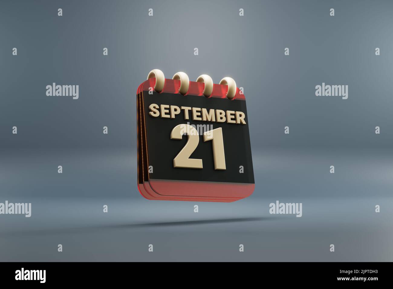 Standing black and red month lined desk calendar with date September 21 ...