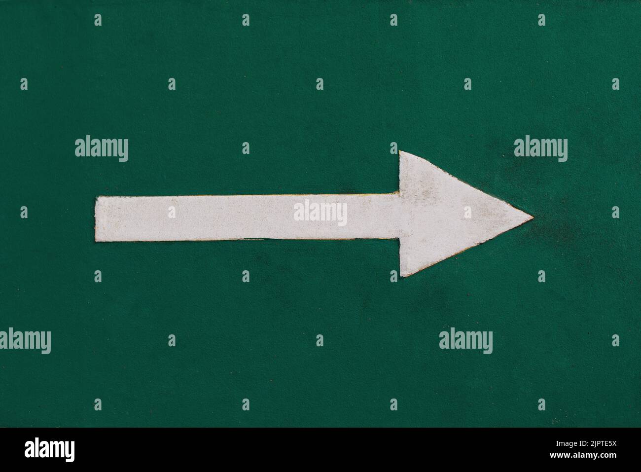 White arrow on green background indicating direction to the right Stock ...