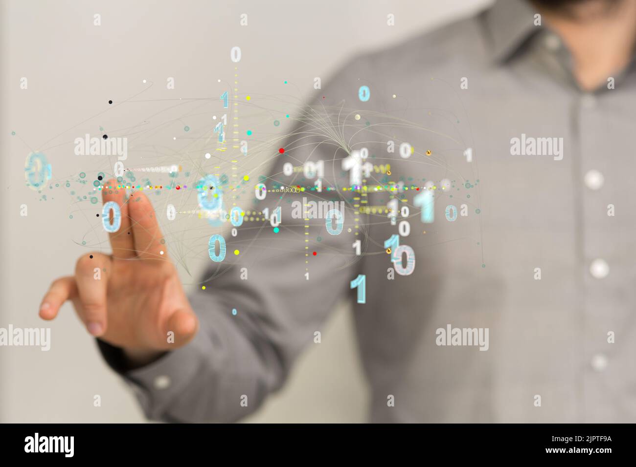 A man's hand pressing illustrative digits against a white background ...