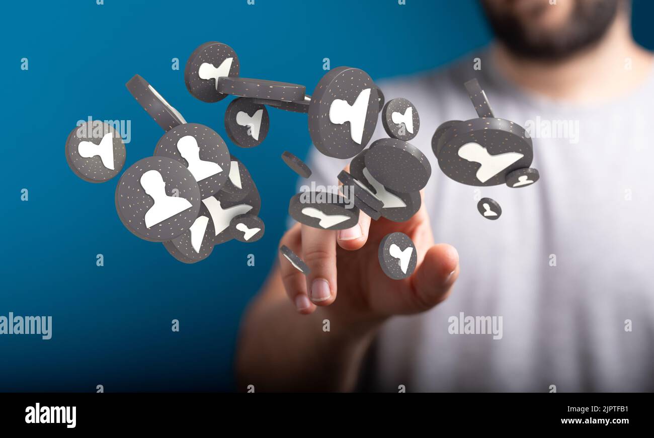 A man pressing illustrative user icons with a digital pen against a ...