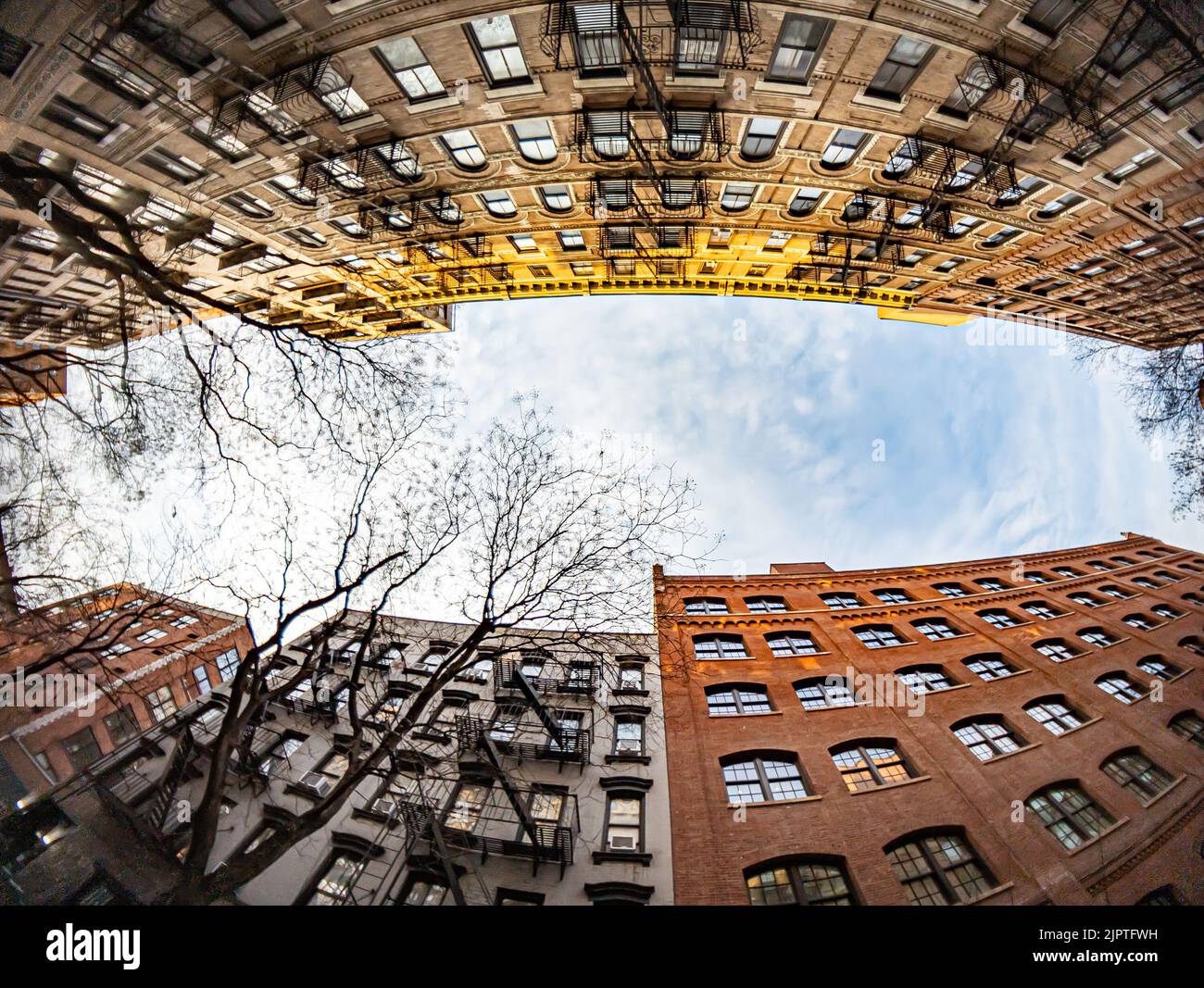 Looking up at a block of historic buildings in Manhattan New York City ...