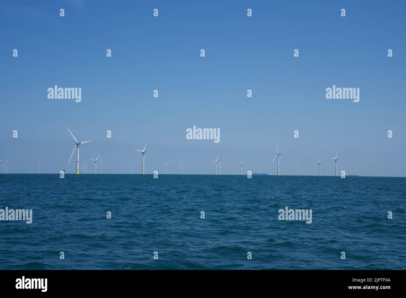 The offshore wind farm with wind turbines in the north sea, Atlantic ...