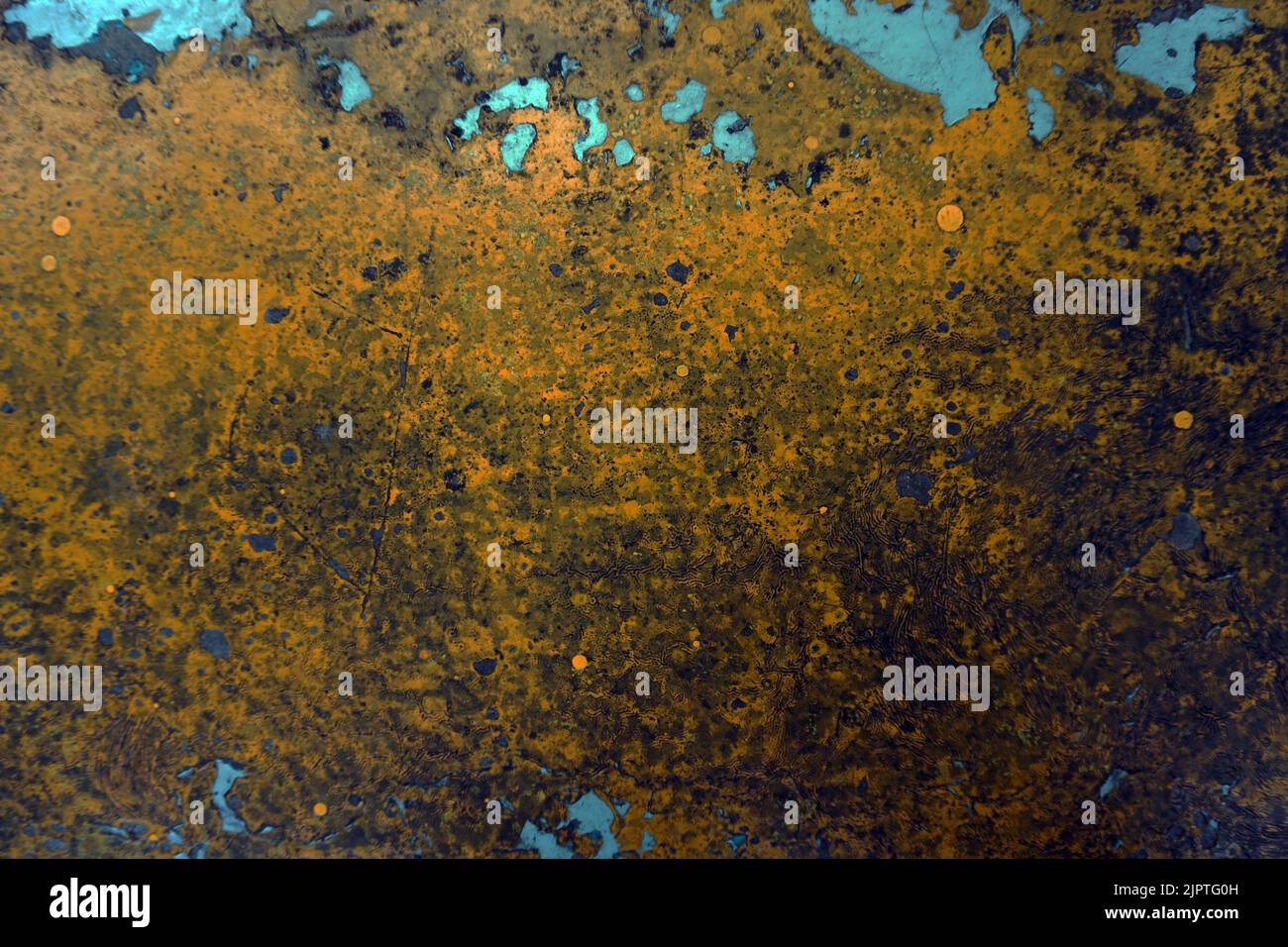 The texture of an old and rusted steel plate is used as a design ...