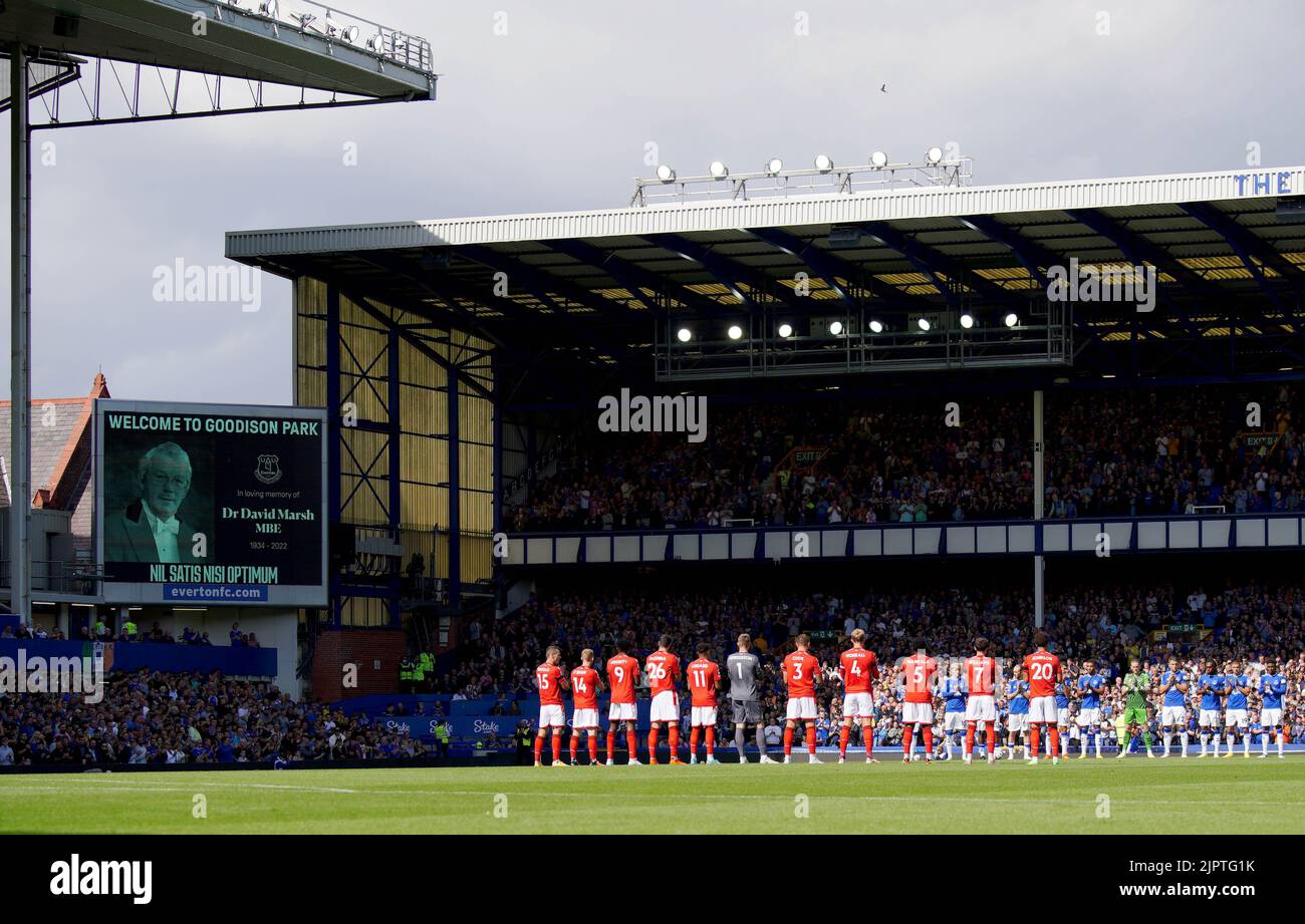 Players from both teams take part in a minutes applause for former ...