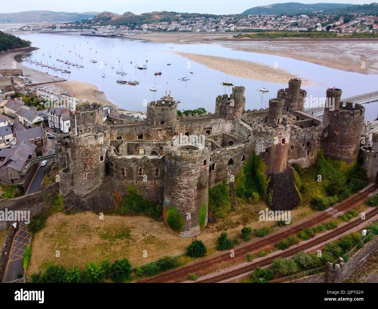Aerial view of Conwy Castle in the town of Conwy in North Wales. It was ...
