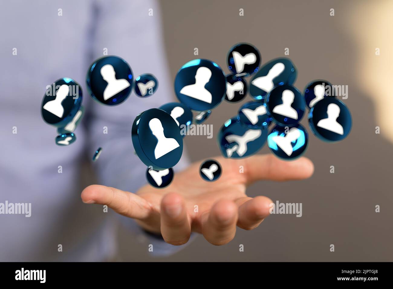 A 3D rendering of a group of floating people icons on a businessman's ...