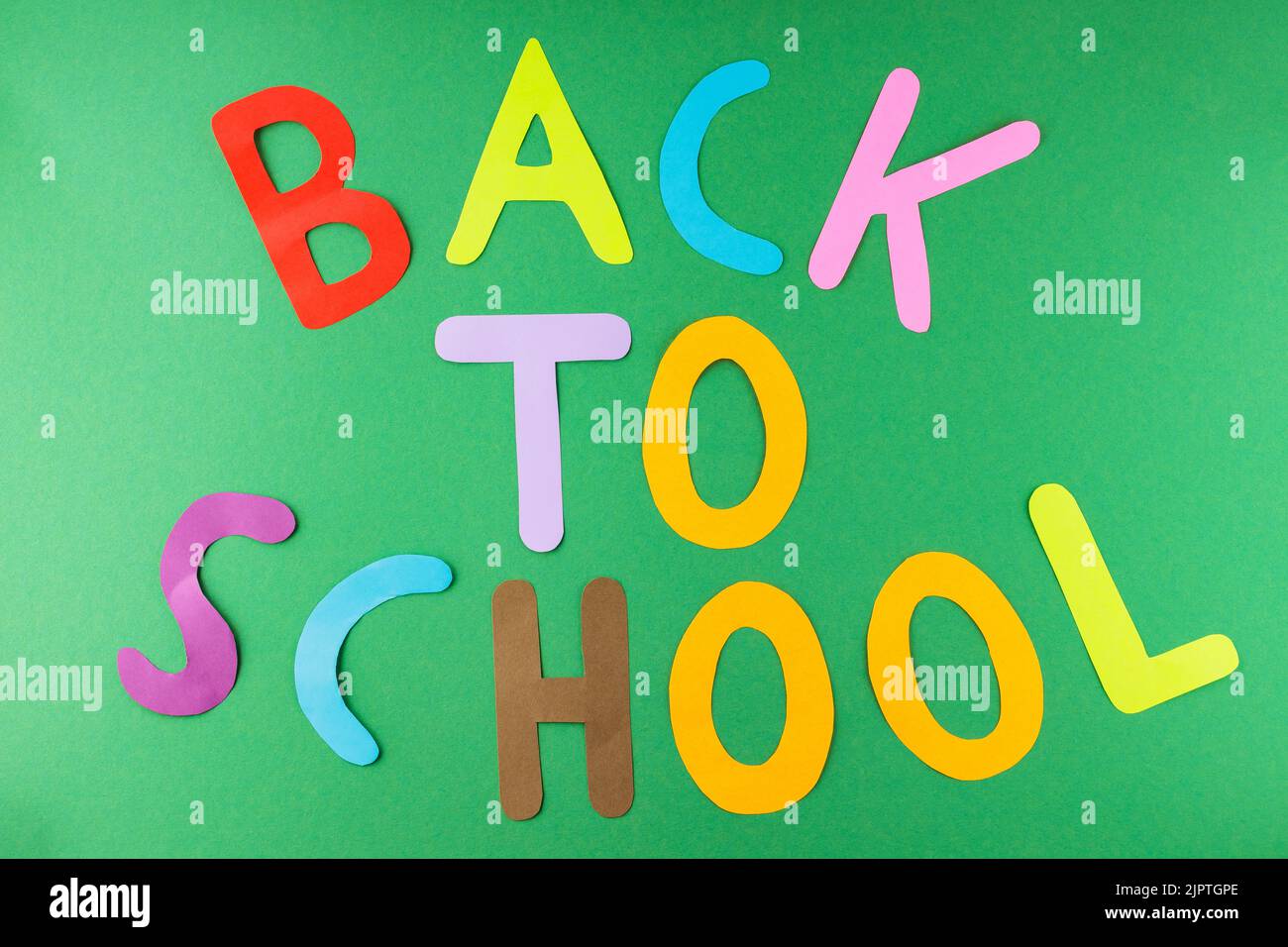 Inscription Back to school with multicolored paper letters. Back to ...