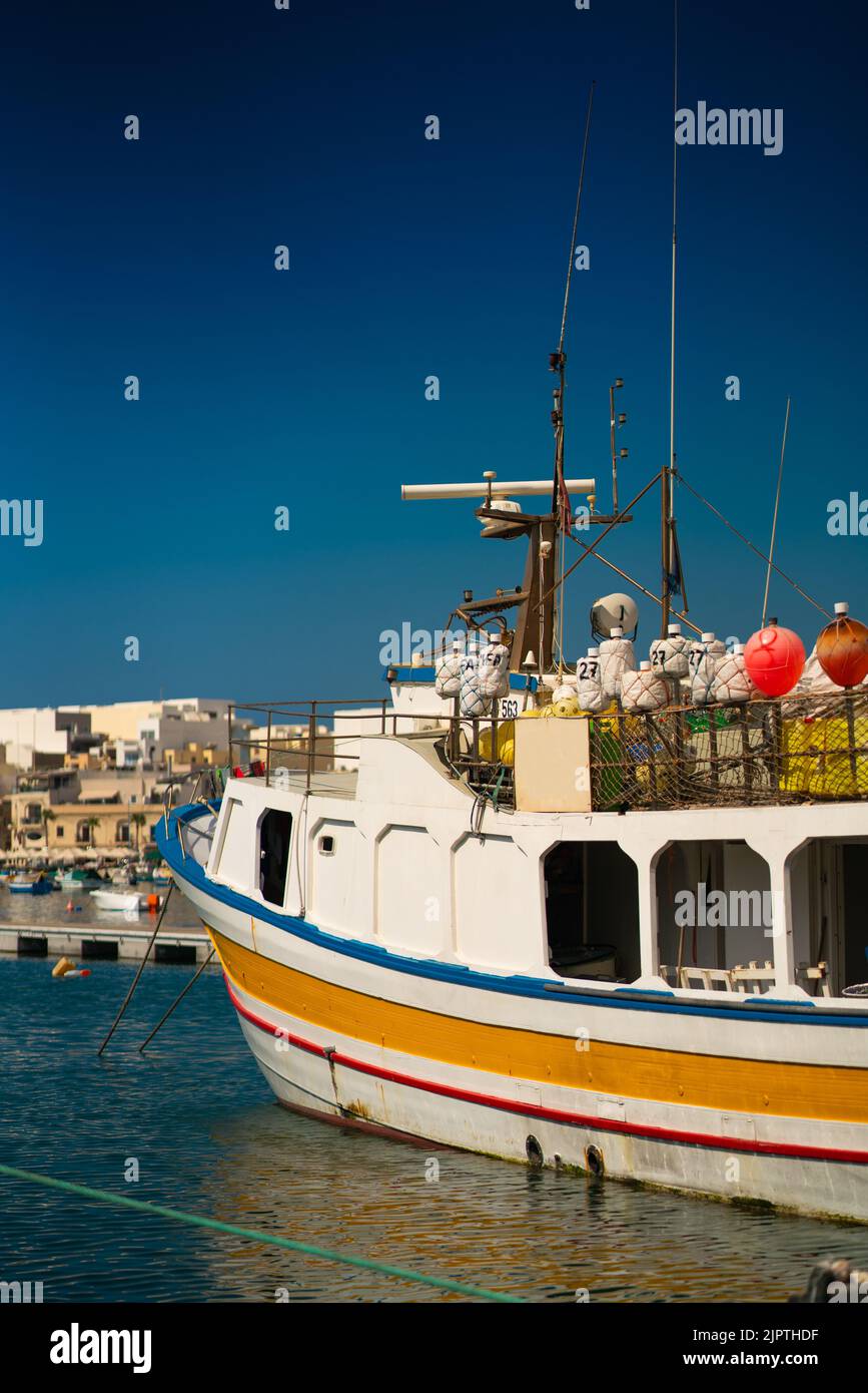 Traditional mediterranean, European boat in fishing village Marsaxlokk ...