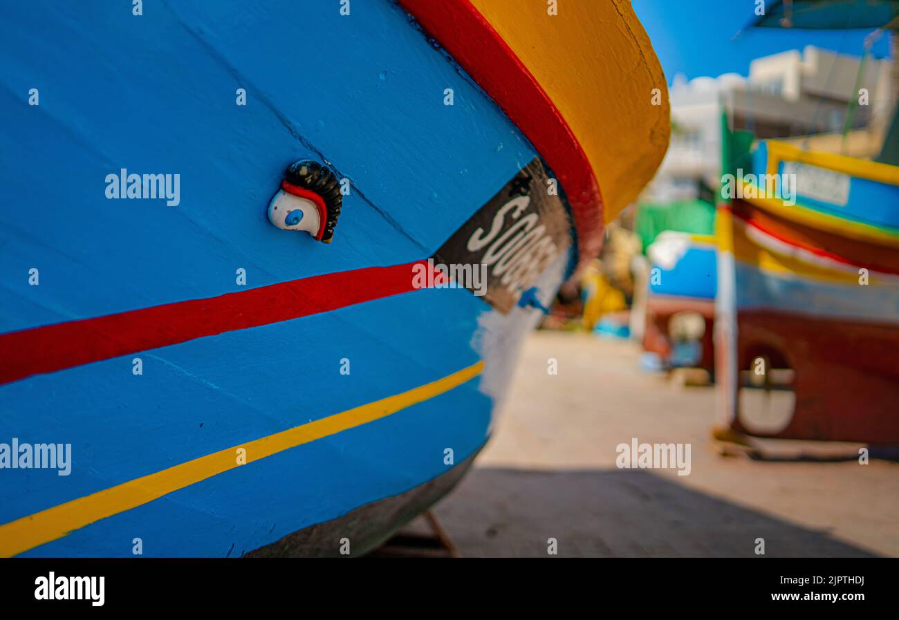 Traditional mediterranean, European boat in fishing village Marsaxlokk ...