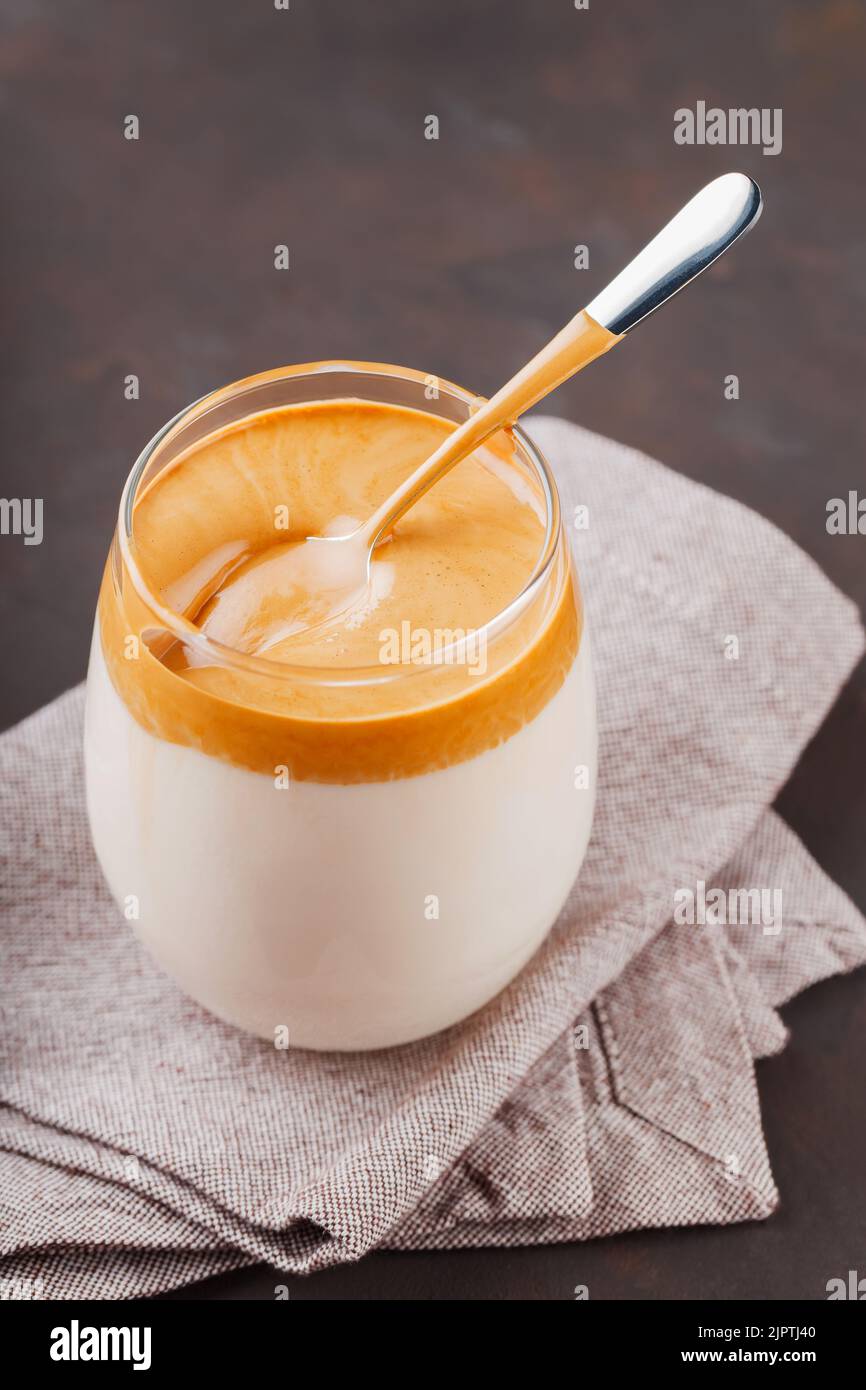 Homemade Dalgona coffee on a dark background. Dalgona frothy coffee ...