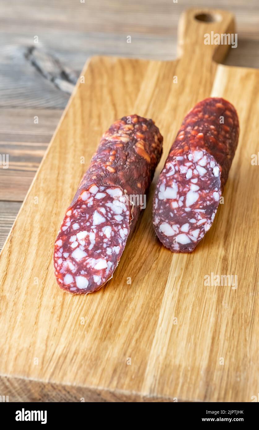 Braunschweiger sausage on the wodden cutting board Stock Photo - Alamy