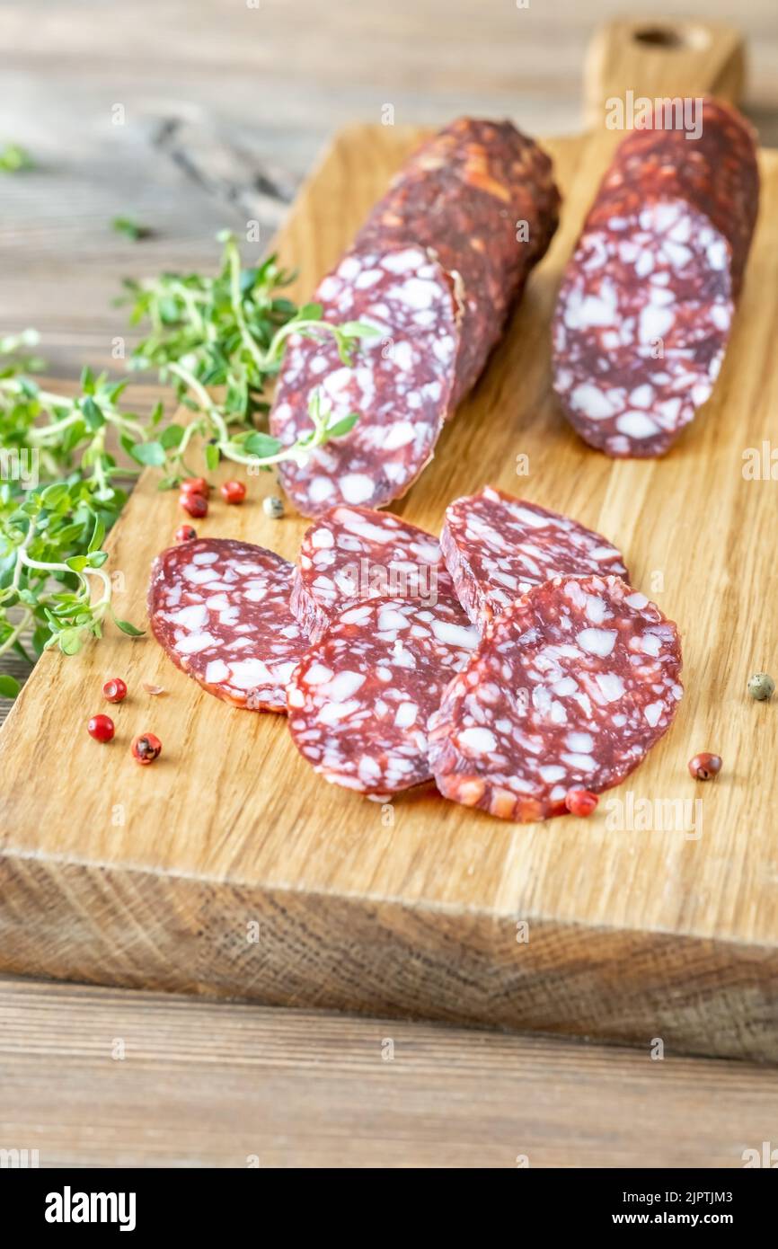 Braunschweiger sausage on the wodden cutting board Stock Photo - Alamy