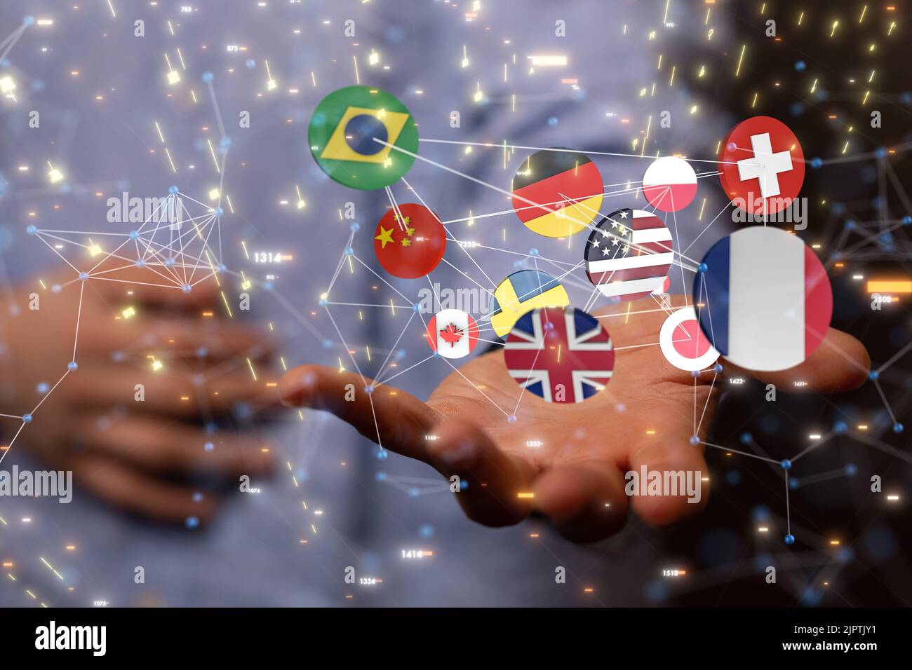 The 3d rendered flags of different countries hovering over a man's hand ...
