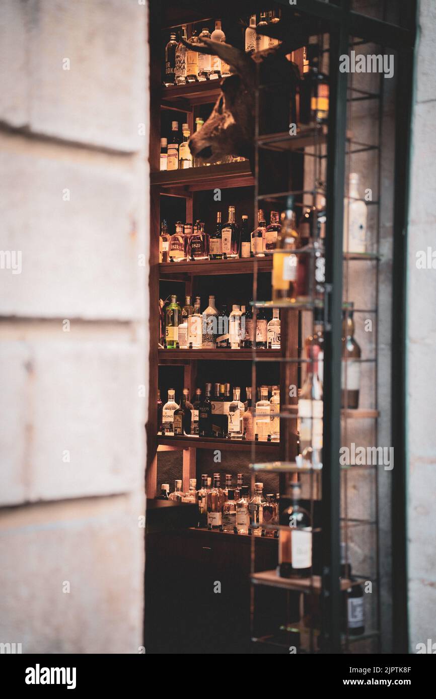 A vertical view of the wine storefront where various drinks are ...