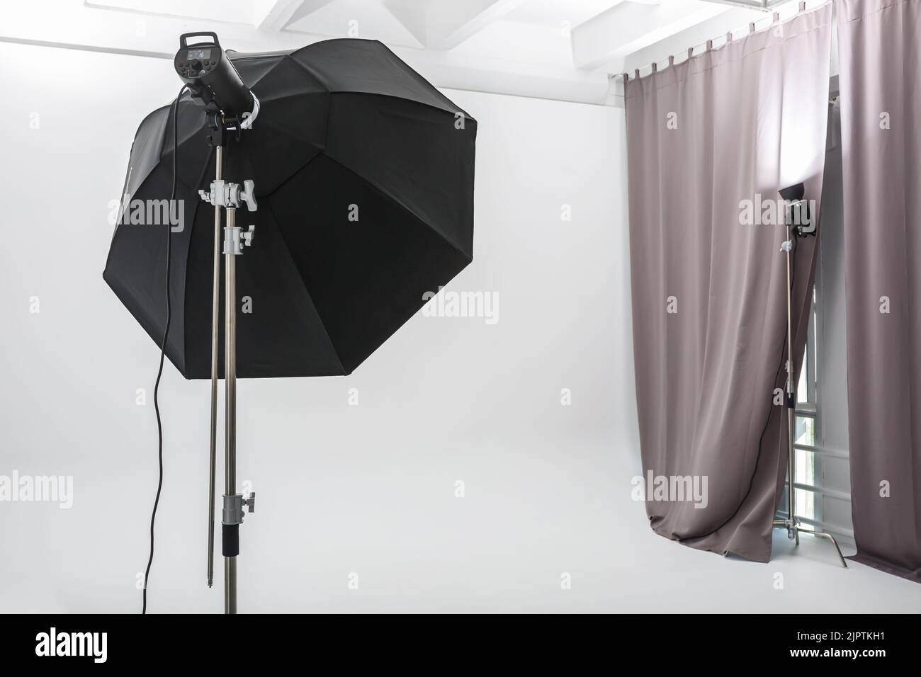 interior of bright space of photo studio with large white cyclorama ...