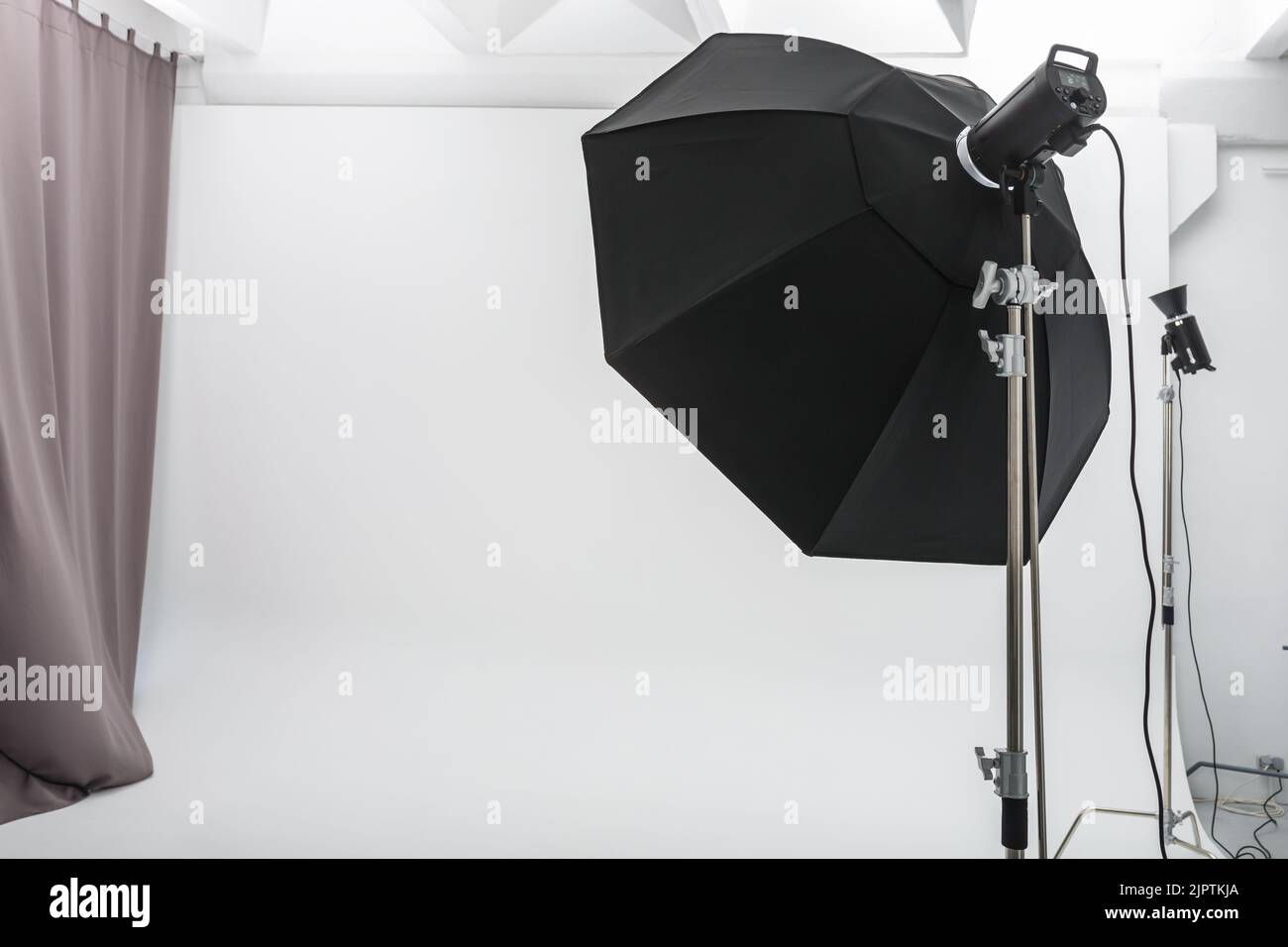 interior of bright space of photo studio with large white cyclorama ...