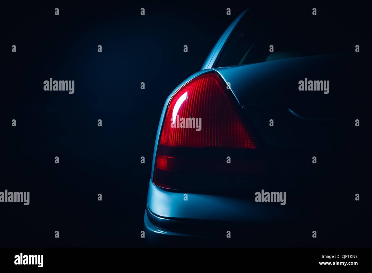 The Tail light of Ford Crown Victoria with a blue light at night Stock ...
