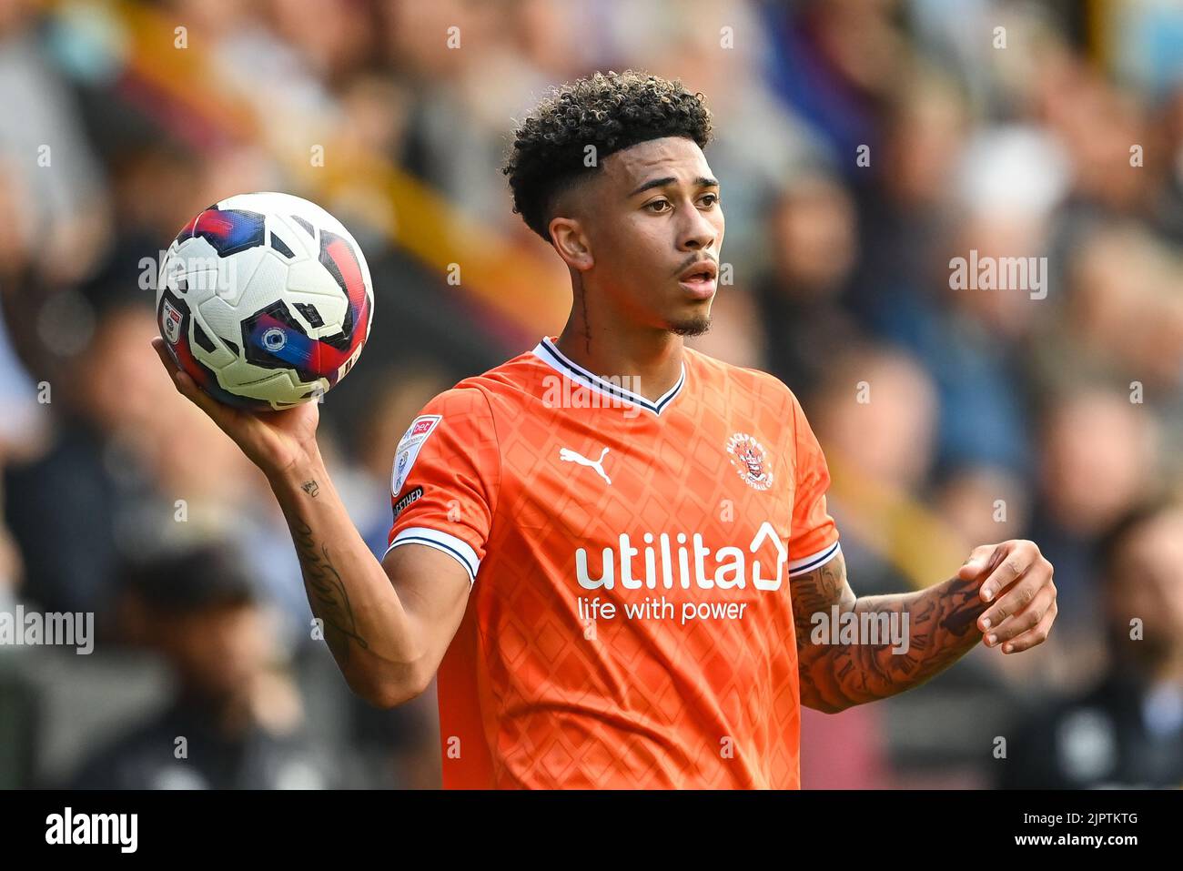 Jordan Lawrence-Gabriel #4 of Blackpool prepares to take a throw in ...