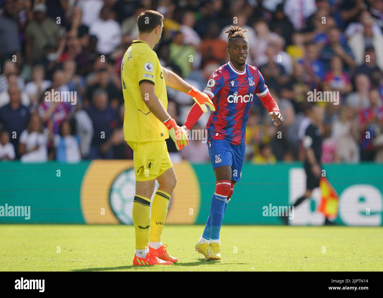 Crystal Palace's Wilfried Zaha shakes hands with Aston Villa goalkeeper ...