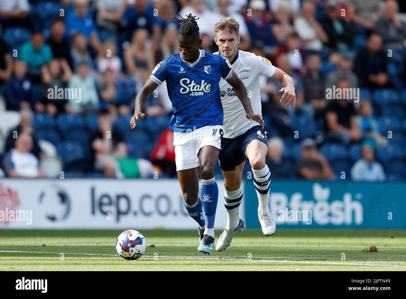 Watford's Vakoun Bayo and Preston North End's Liam Lindsay in action ...
