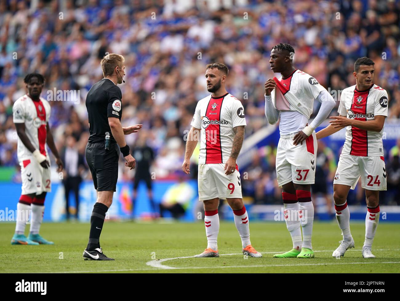 Referee Michael Salisbury speaks to Southampton's Adam Armstrong, Armel ...
