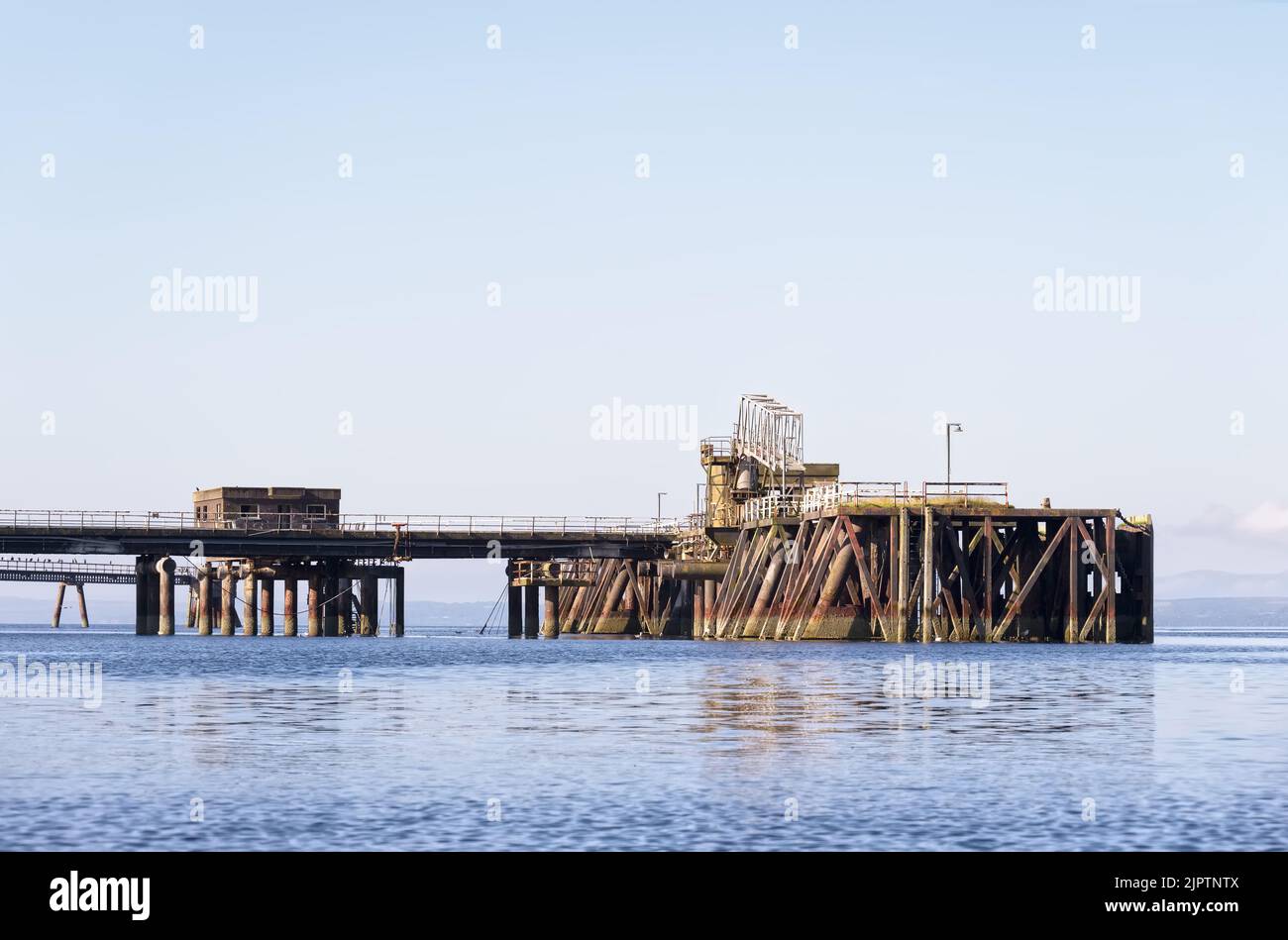 Old derelict wooden jetty pier in sea at Inverkip power station Stock ...