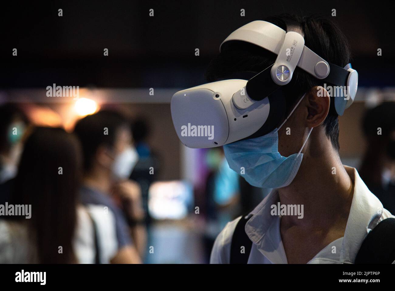 A visitor experiences a virtual reality (VR) at the Thailand Metaverse ...