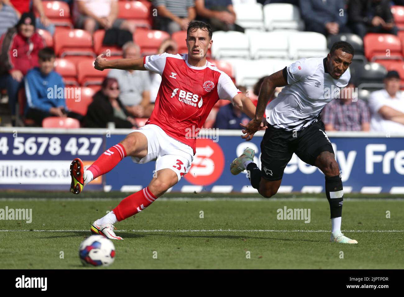 Fleetwood Town's Joshua Earl (left) and Derby County's Nathaniel Mendez ...