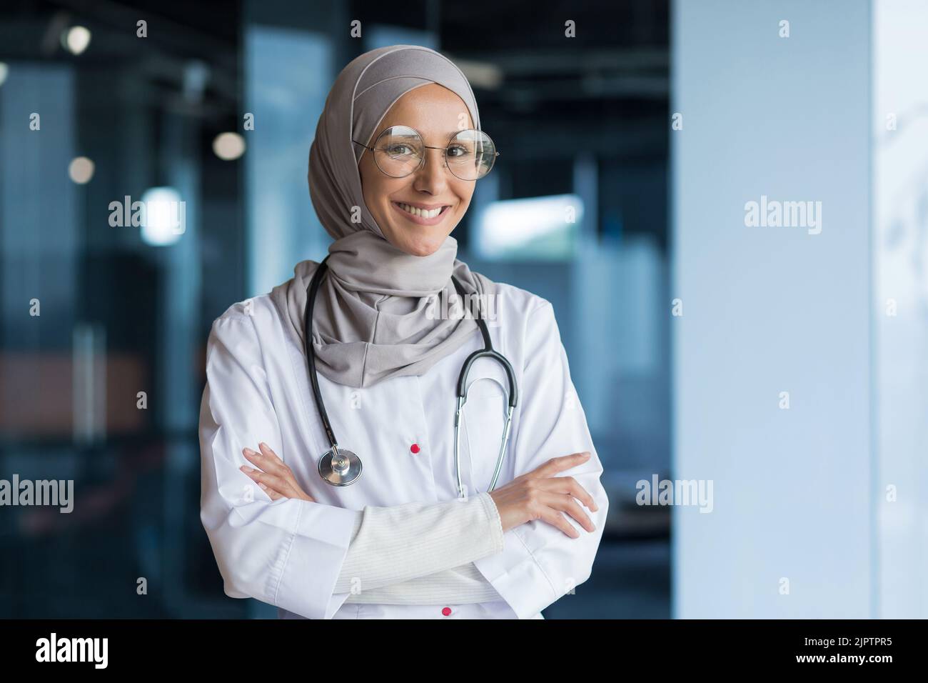 Portrait of Arabic female doctor in modern clinic, Muslim woman wearing ...