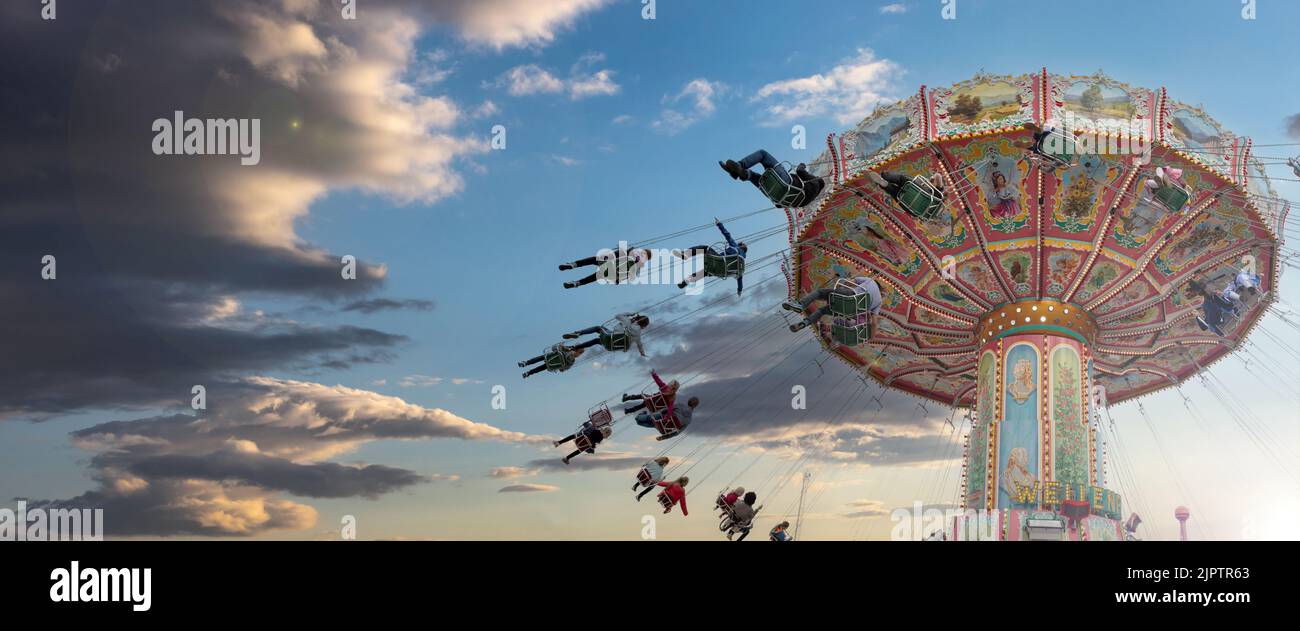 Oktoberfest, Munich amusement park, Ride swing carousel in motion ...