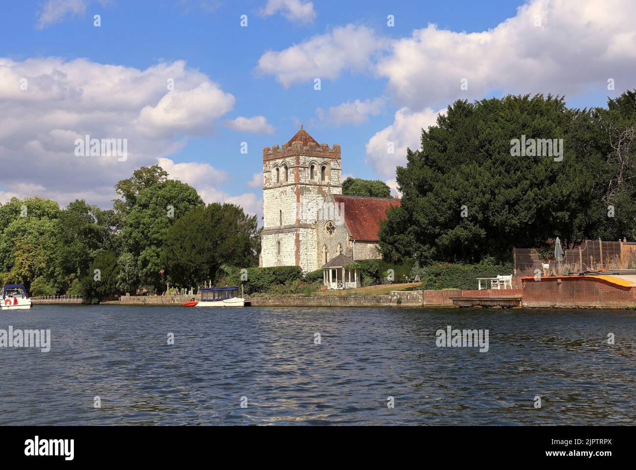 English Village Church and Tower on the river Thames at Bisham, with ...