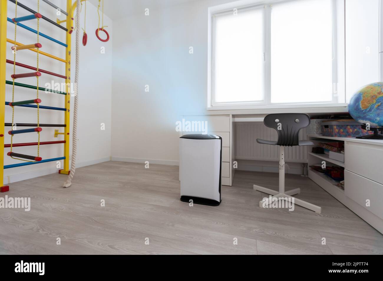 Modern air humidifier in children's room, aroma oil diffuser at home ...