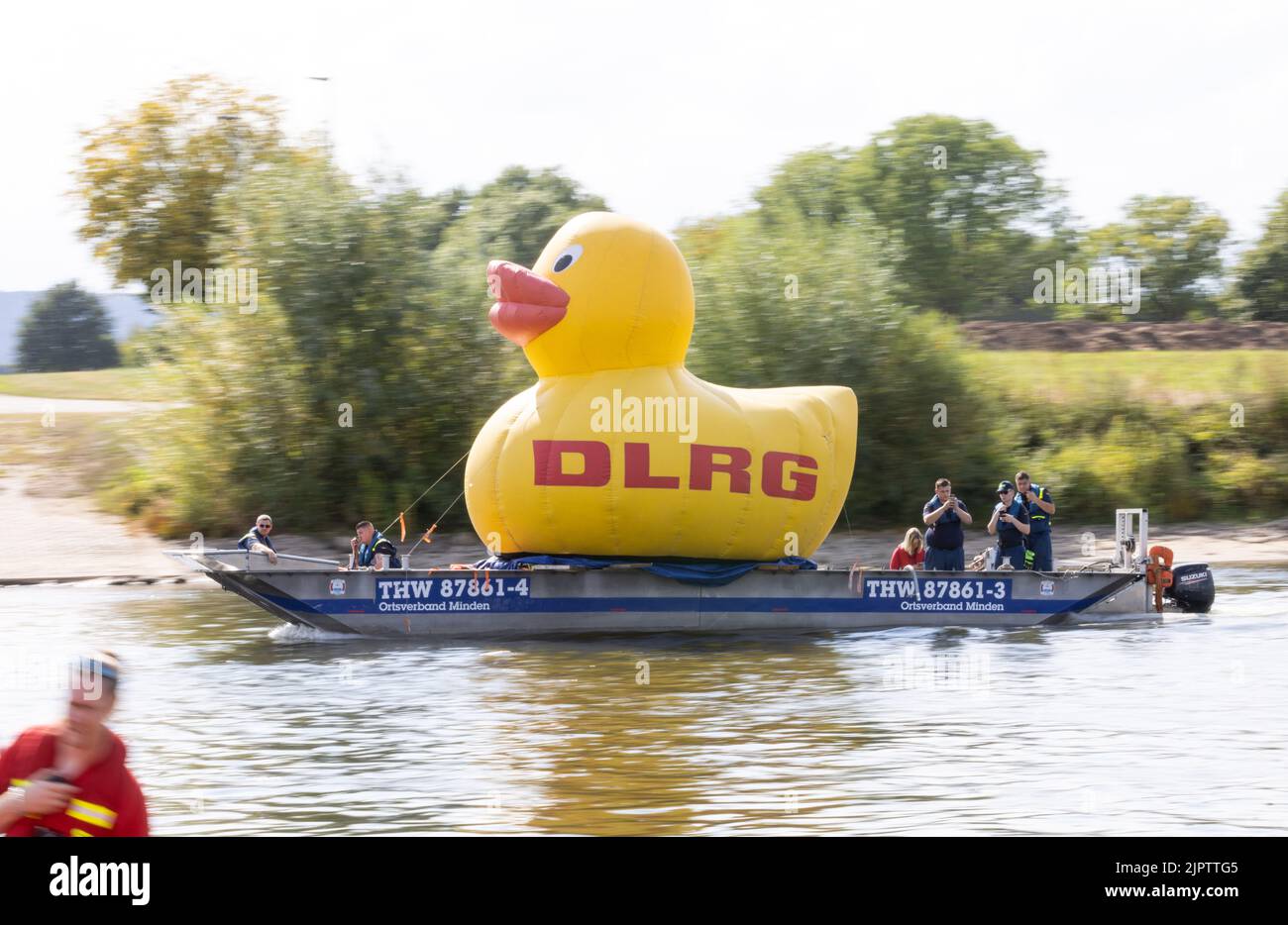 Minden, Germany. 20th Aug, 2022. A boat of the DLRG with a huge rubber ...